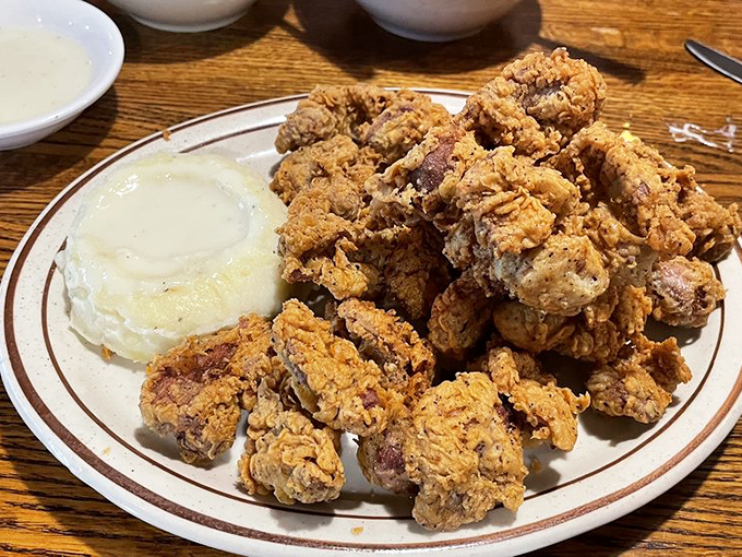 Crispy gizzards and livers that transform the overlooked into the unforgettable. For the adventurous eater, these Southern delicacies are a revelation.
