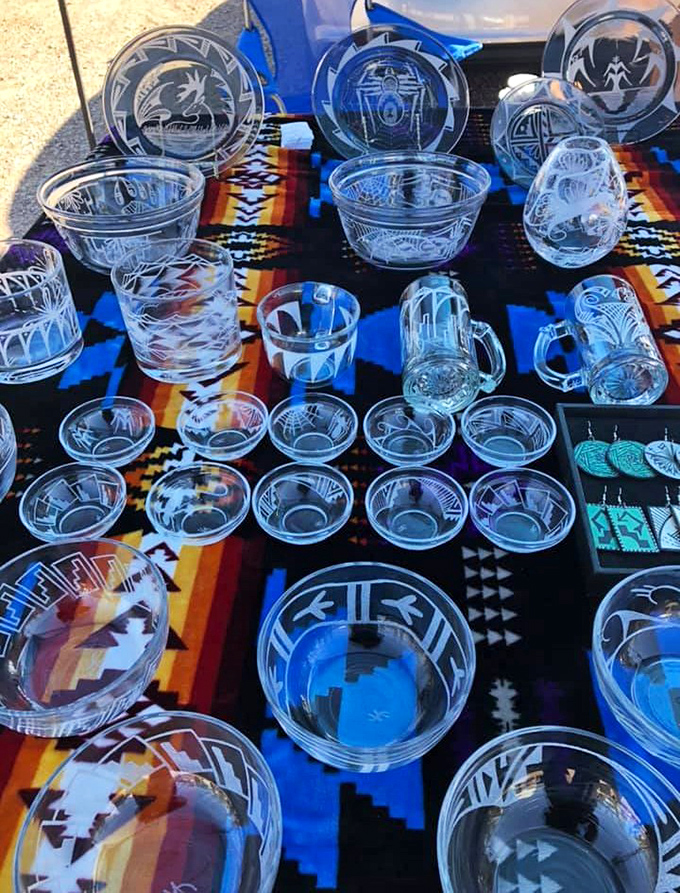 Hand-etched glassware catches the light, featuring Southwestern motifs that'll class up your next dinner party.