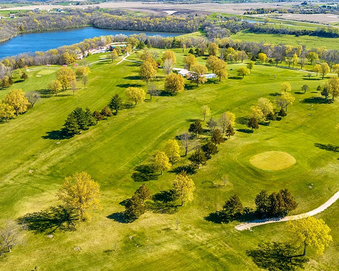 Rolling green fairways stretch endlessly, offering golfers views that rival any expensive resort destination.