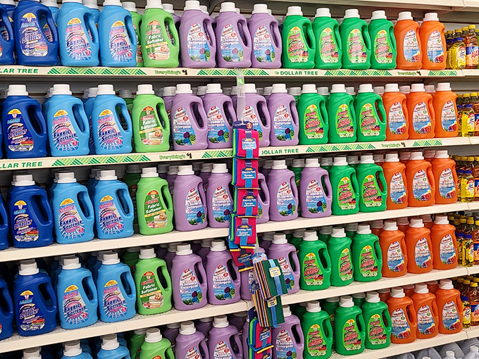 A rainbow of laundry detergent bottles stands at attention, ready to tackle everything from prairie mud to potluck spills.