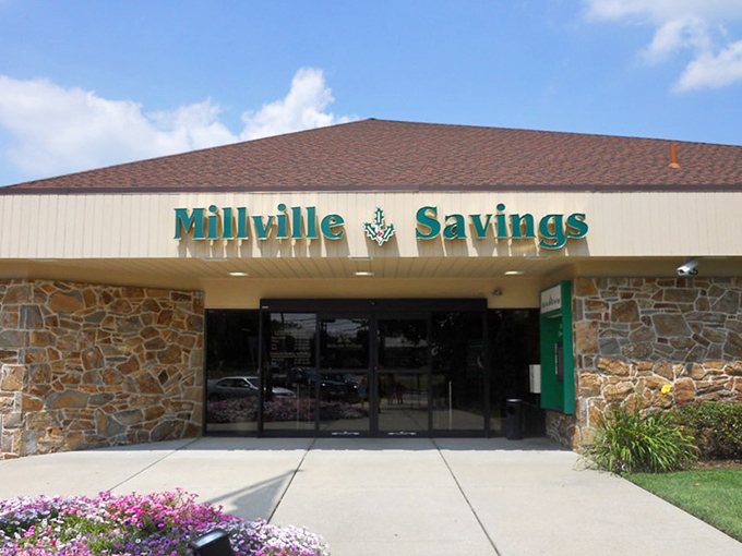 Millville Savings Bank's stone facade speaks to the community's financial stability. Managing retirement funds feels more secure in a city where affordability is built into the foundation.