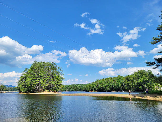 Moore Reservoir's pristine shoreline offers a tranquil escape where the White Mountains meet crystal clear waters.