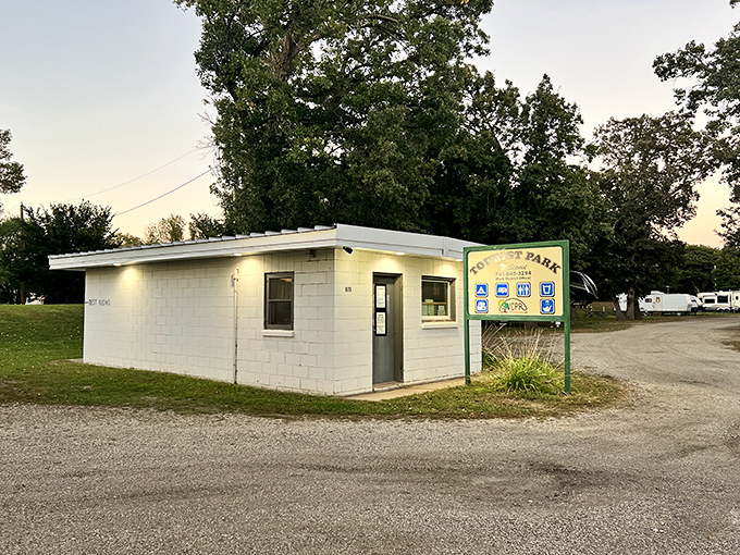 Tourist Park's humble welcome center proves you don't need flash to offer genuine hospitality. Sometimes the best adventures start at the simplest doorways.