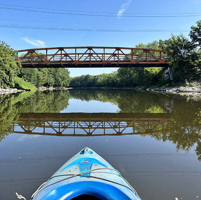 Kayaking under New Paltz's bridges offers a duck's-eye view of the town, where reflections double the beauty of this riverside gem.