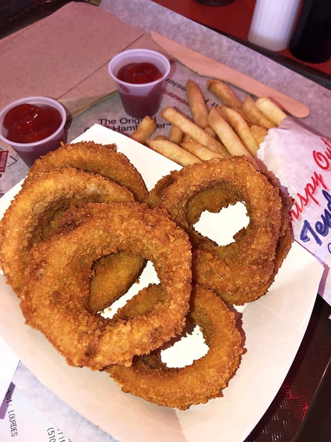 Those onion rings are so perfectly golden and crispy, they could be used as Olympic medals for fried food.
