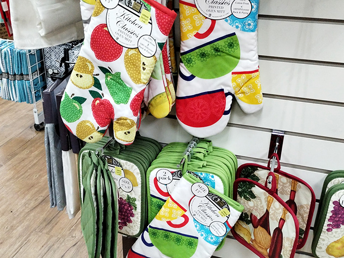 Kitchen mitts and potholders bursting with fruit patterns so cheerful they almost make you look forward to pulling that casserole from the oven.
