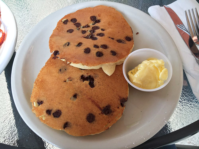 Chocolate chip pancakes that make you question why anyone would eat cereal. Fluffy, golden discs of happiness with melty chocolate surprises in every bite.