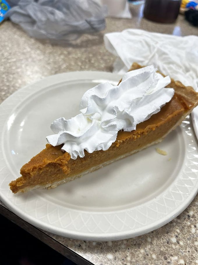 Pumpkin pie with a cloud of whipped cream that doesn't come from a spray can &ndash; this is dessert that respects tradition while satisfying your sweet tooth.