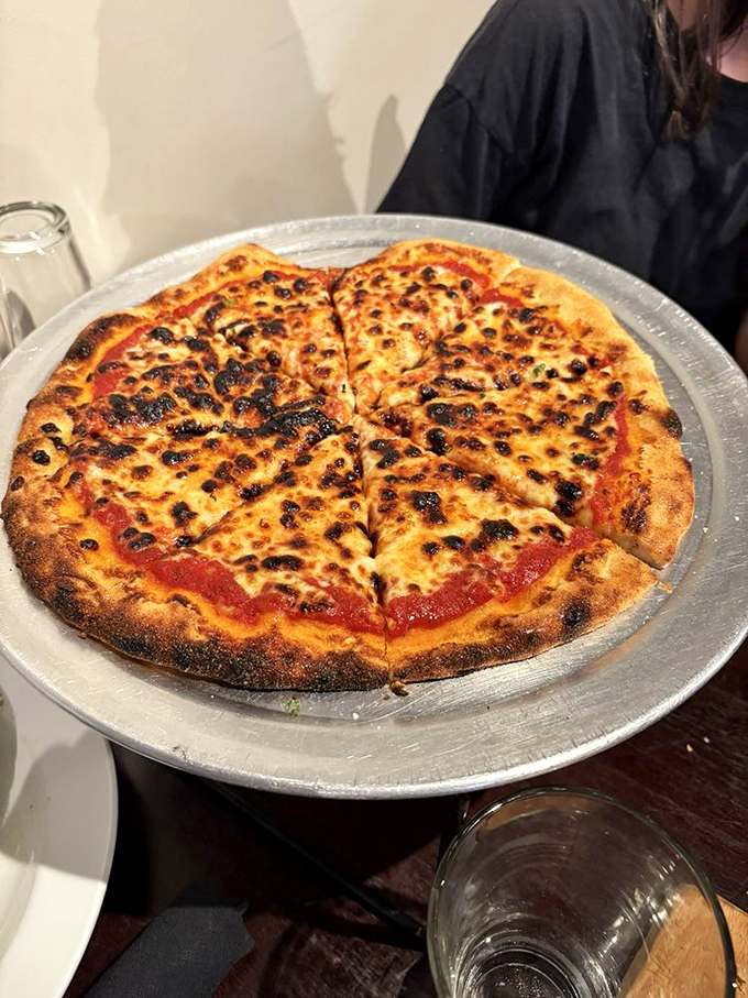 Pizza with perfectly blistered crust and that ideal cheese-to-sauce ratio that makes you wonder why you ever order delivery.