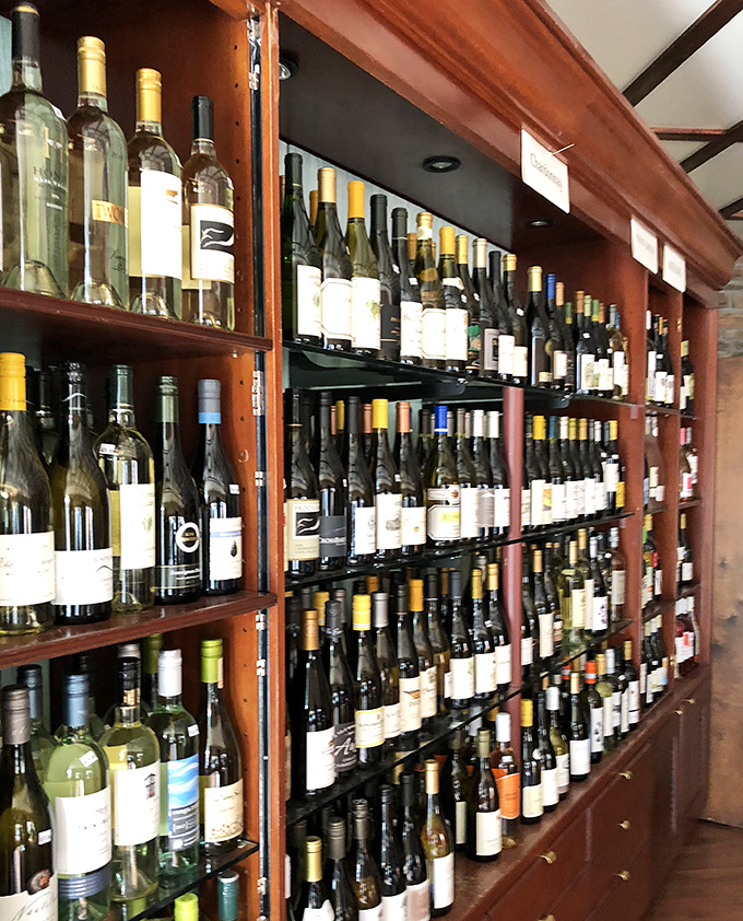Wine selection that would make Napa Valley nod in approval, housed in warm wooden shelving that invites lingering and discovery.