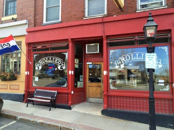 Rollie's Bar and Grill's bright red facade signals comfort food and local conversation&mdash;Belfast's living room for over four decades.