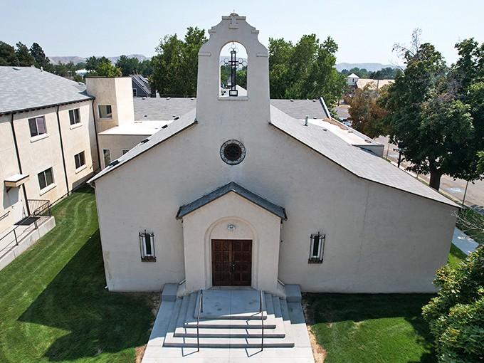 Sacred Heart Catholic Church's simple elegance reminds us that spiritual comfort doesn't require cathedral ceilings or stained glass extravagance.