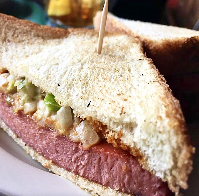 This sandwich isn't just lunch&mdash;it's architecture. The thick-cut bologna has been transformed from lunchbox staple to smokehouse royalty.