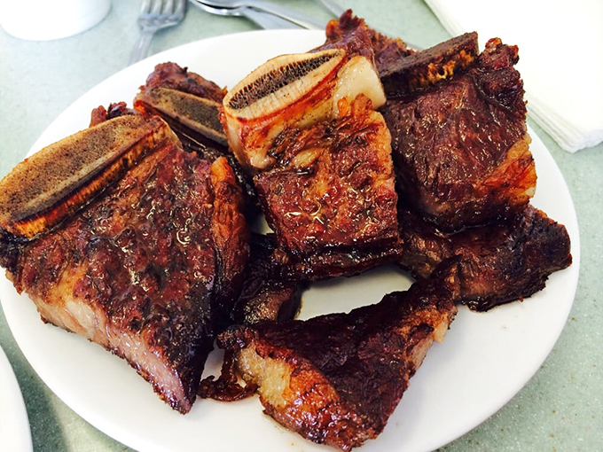 Pipikaula short ribs &ndash; Hawaii's answer to beef jerky &ndash; with caramelized edges and a savory-sweet chew that makes them impossible to stop eating.