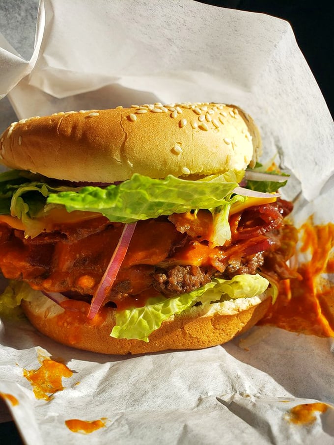 A burger with attitude and altitude. The vibrant sauce and fresh toppings create a flavor explosion worthy of the Last Frontier.