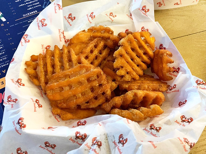 Waffle-cut sweet potato fries that crunch like autumn leaves but taste like summer sunshine. The perfect seafood sidekick.