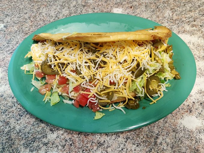 This taco plate brings a fiesta to your morning, with enough cheese to make you contemplate the meaning of "too much" (spoiler: there isn't one).