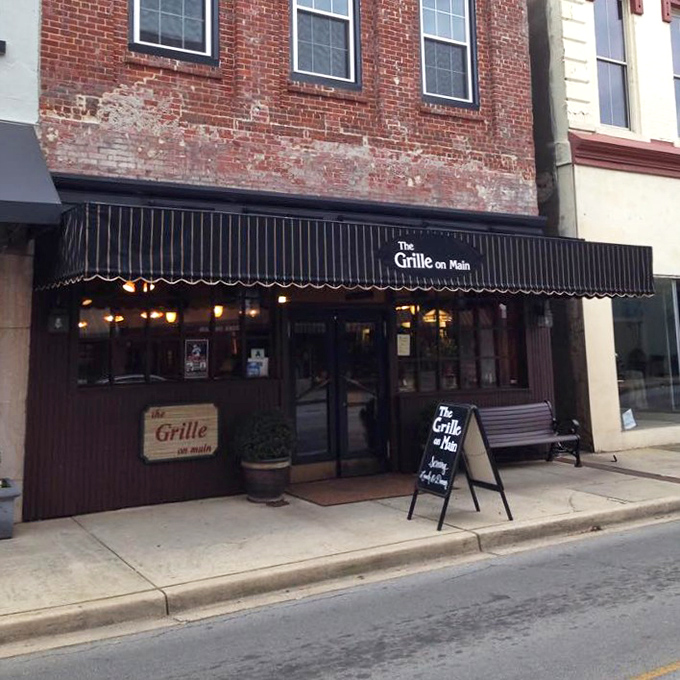 The Grille on Main serves up Southern hospitality behind that classic awning. The kind of place where "just a quick bite" turns into a two-hour conversation.