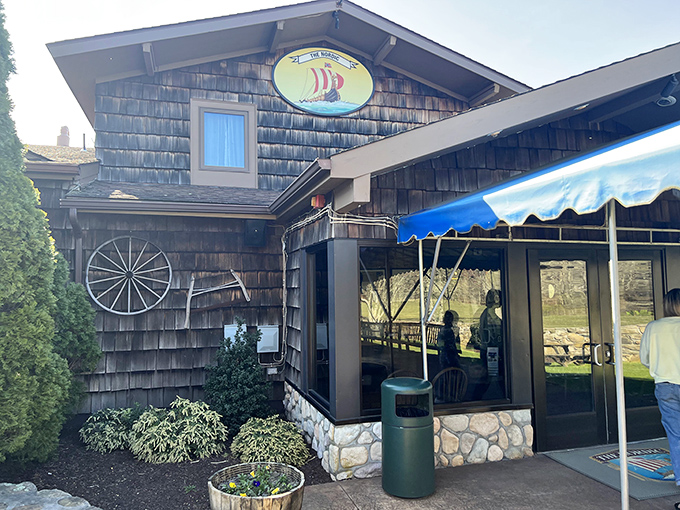 Cedar shingles and seafood dreams. The Nordic's classic coastal architecture houses generations of Rhode Island dining traditions beneath its weathered, salt-kissed roof.