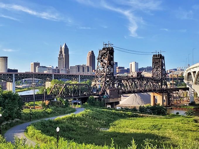 Cleveland's industrial bridges frame the skyline like a movie set, where the city's gritty past and bright future converge beautifully.