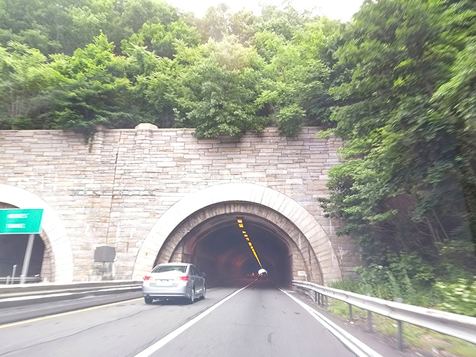 This isn't just a tunnel; it's a portal between worlds. One moment you're in modern Connecticut, the next you're in a storybook.