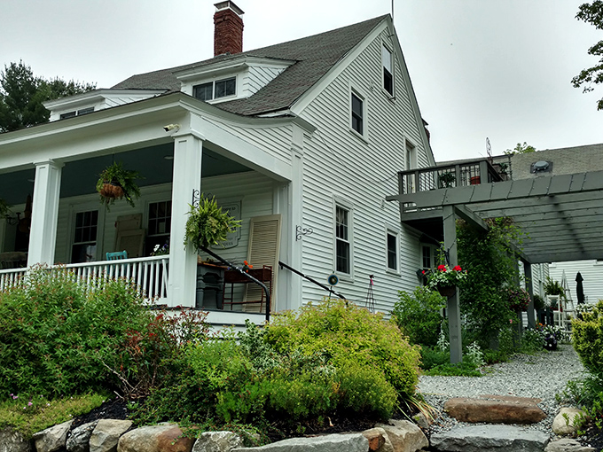 Twin Elm Farm's welcoming porch and lush gardens invite you to slow down. The kind of place that makes you consider a simpler life.