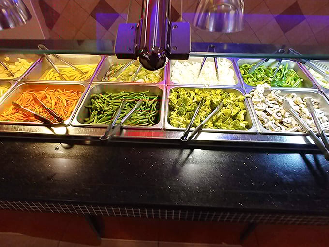 A rainbow of vegetables stands at attention, proving that even at a buffet, your mother's advice about eating colorful foods still applies.