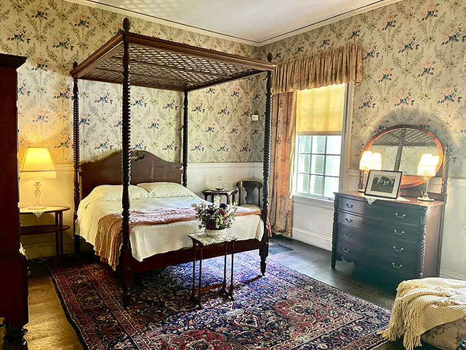Sleep like American royalty in this four-poster bedroom—where Victorian elegance meets what passed for comfort in the early 1900s.
