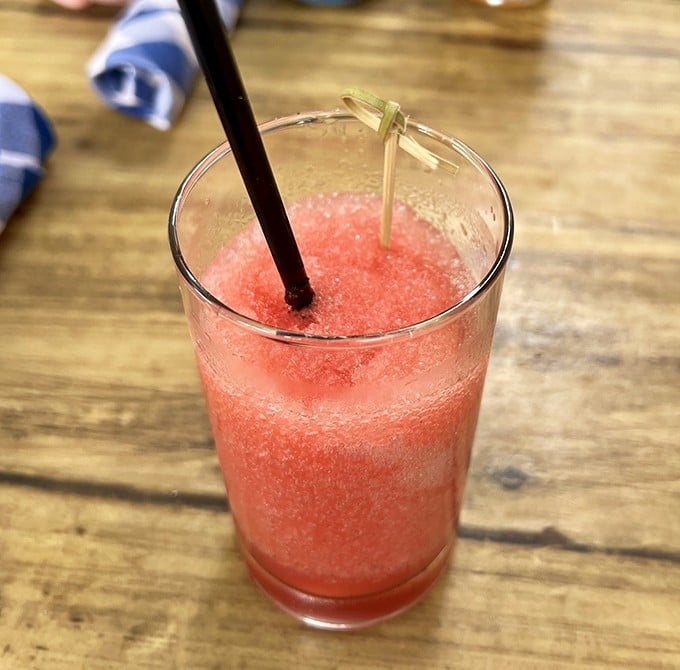 This watermelon slush cocktail doesn't just refresh&mdash;it rescues you from summer heat with each sip. Adult popsicle in liquid form.