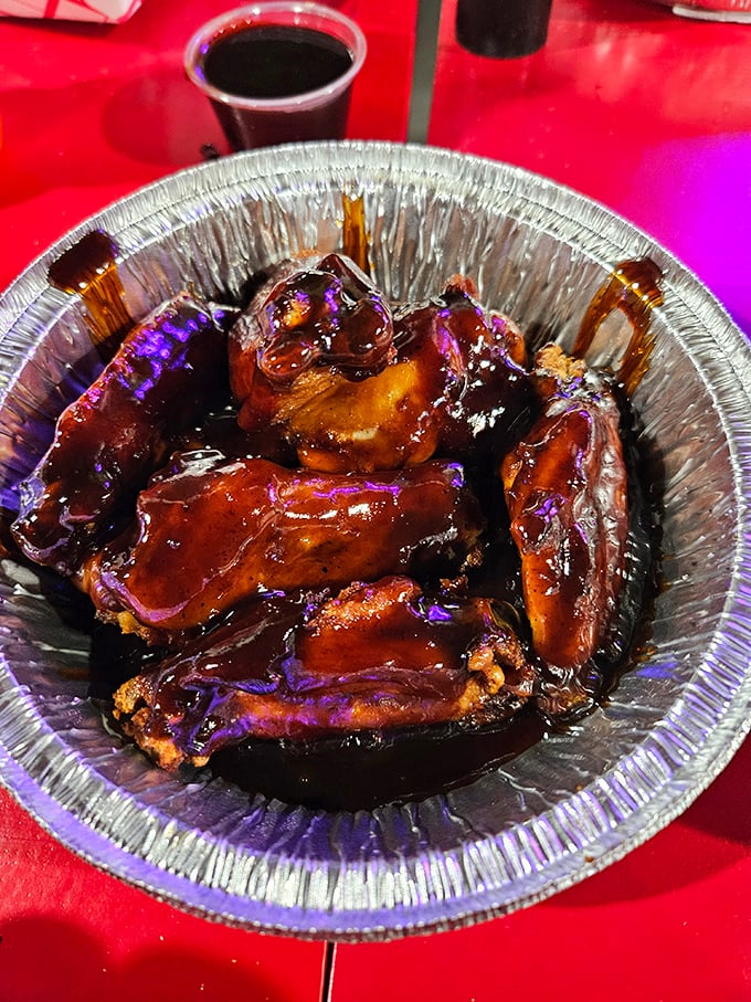 These wings aren't just swimming in sauce&mdash;they're practically doing the backstroke in a pool of sticky, sweet glaze that demands extra napkins.