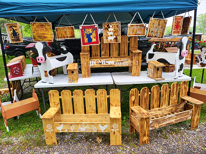 Rustic charm by the truckload! Handcrafted wooden decor brings farmhouse aesthetic to life, complete with cow cutouts that would make Joanna Gaines reach for her wallet.