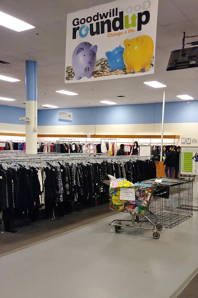 The "Goodwill Round Up" sign reminds us that shopping here helps others. Your spare change funds job training programs throughout New Mexico.