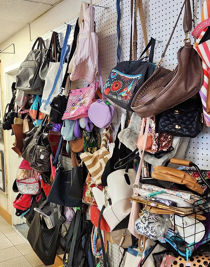 Bag bonanza! From practical totes to statement purses, this wall of possibilities proves one shopper's castoff is another's signature accessory.