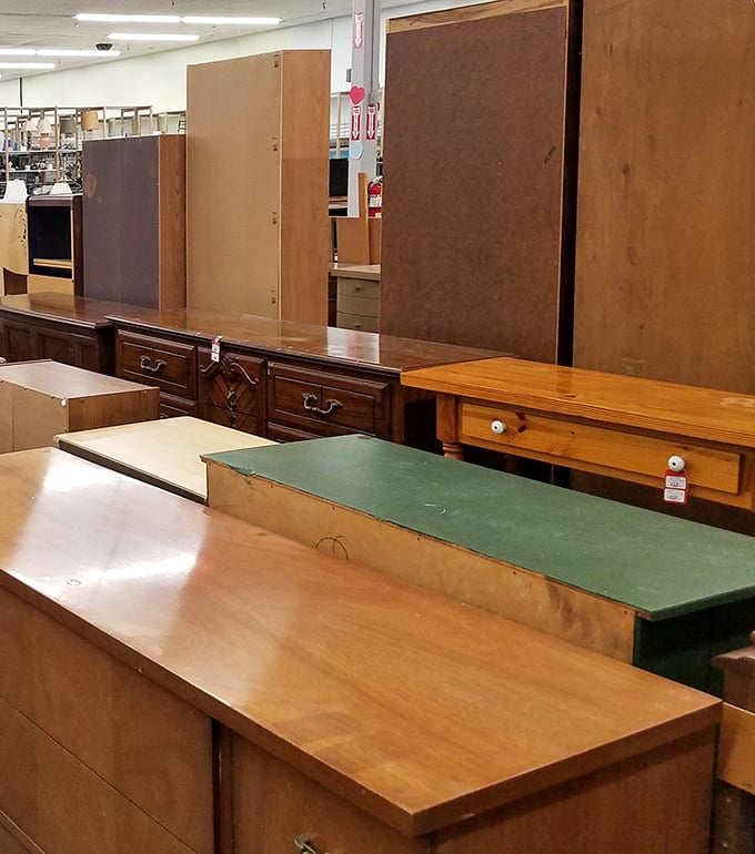 Desks and cabinets lined up like contestants in a beauty pageant for furniture. That green-topped desk has "home office potential" written all over it.