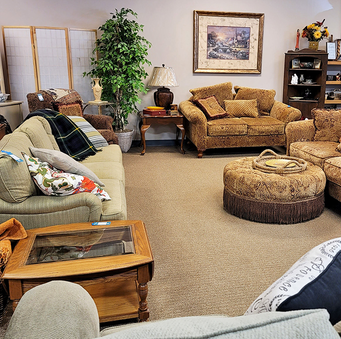 Living room vignettes staged with such care you'll want to sit down and stay awhile. That ottoman has "put your feet up" written all over it.