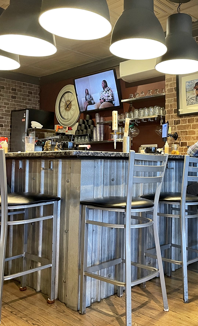 The counter seating offers front-row tickets to the breakfast show, where coffee flows freely and kitchen magic happens before your eyes.