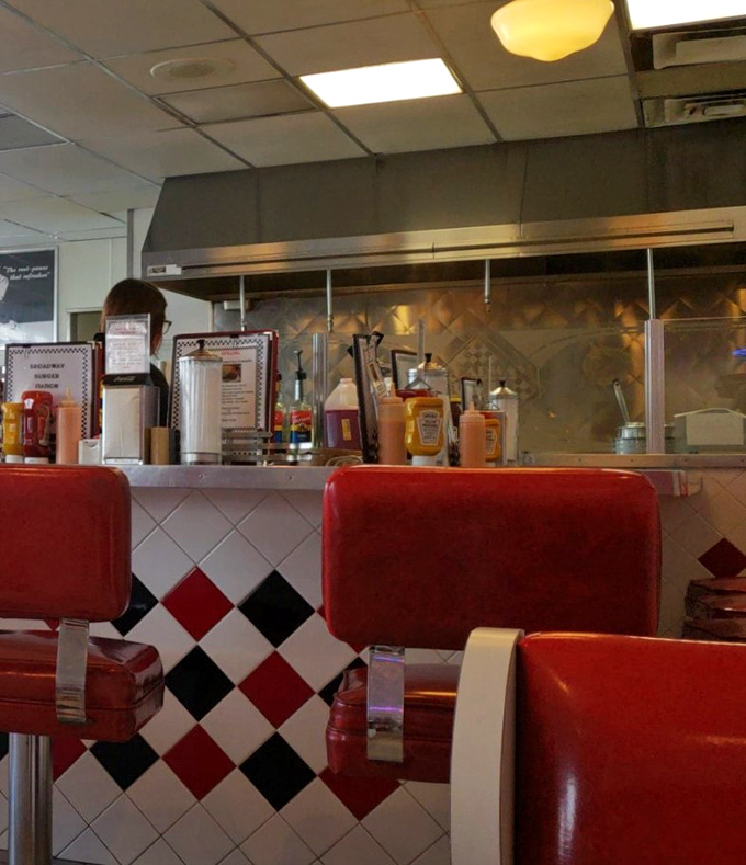 The counter seating offers front-row tickets to the short-order ballet performed daily by Broadway's kitchen crew.