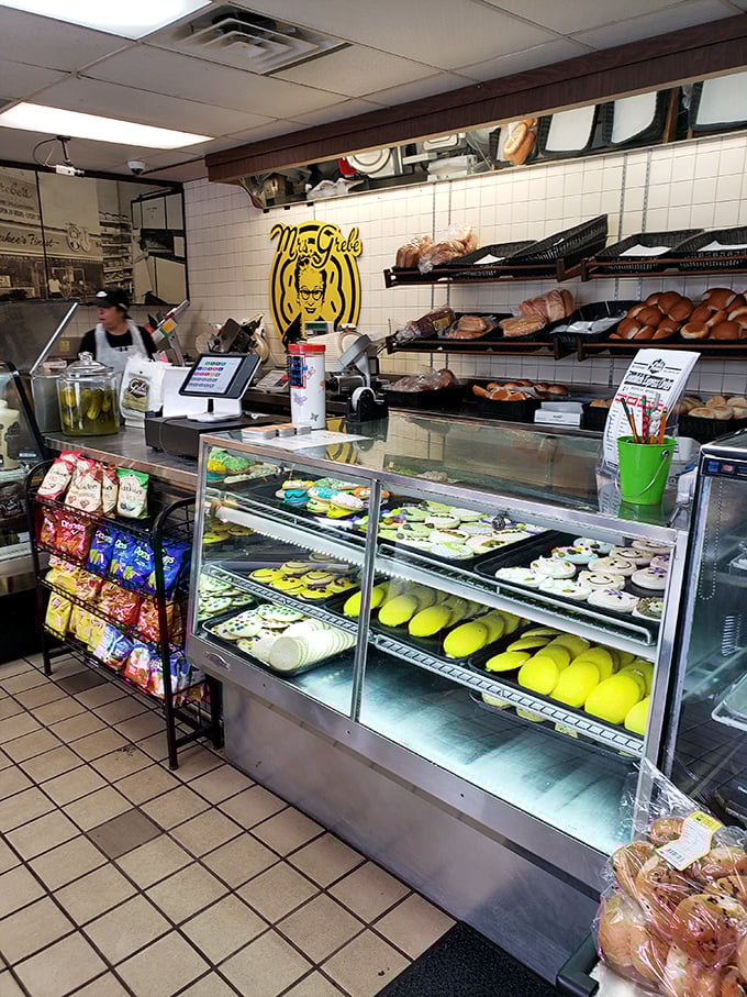 Behind this counter, magic happens daily. The display cases are like museum exhibits, except you're encouraged to eat the artifacts.