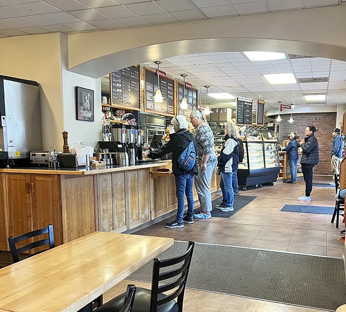 The morning ritual: locals lining up for their daily bread fix, a testament to flour-dusted devotion that keeps this place humming.