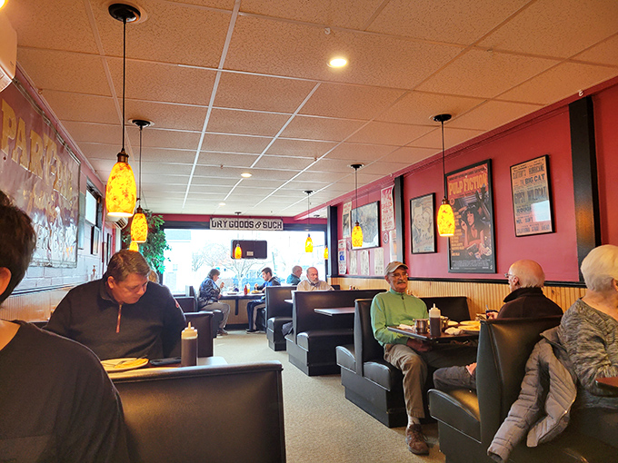 Yellow pendant lights illuminate booths where Maine's morning stories unfold over steaming cups of coffee and hearty plates.