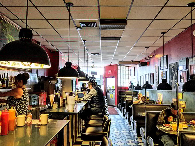Red walls, pendant lights, and booths that have cradled thousands of hangovers back to health over the decades.