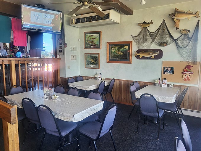 Fish mounts and fishing nets adorn the walls, silently testifying that your dinner probably has relatives watching you eat from above.