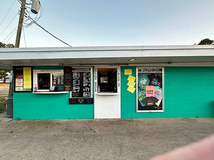 The turquoise concession stand isn't just about food&mdash;it's a social hub where strangers become neighbors over shared anticipation for butter-drenched popcorn.
