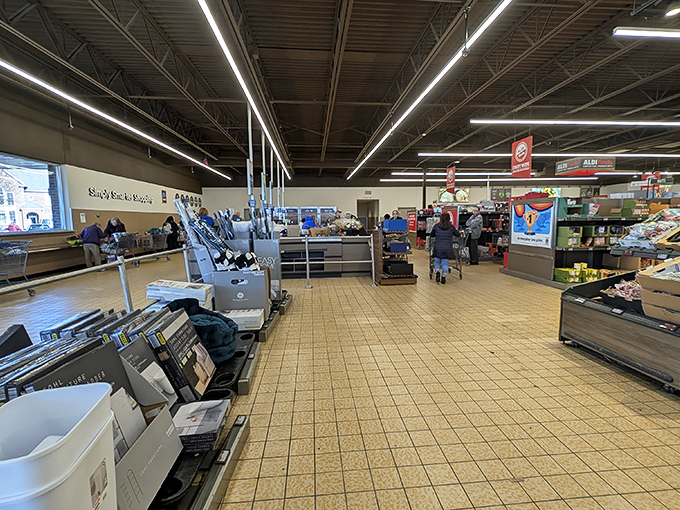 The famous middle aisle beckons with its siren song of unexpected treasures. One minute you're shopping for milk, the next you're considering a kayak.
