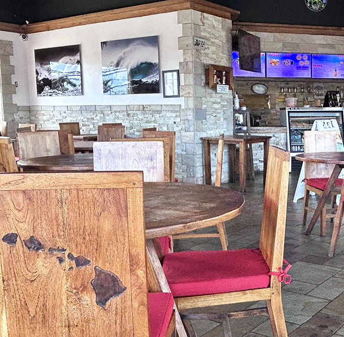 Surf photos on stone walls remind you exactly where you are – in that perfect sweet spot between ocean adventure and culinary bliss.