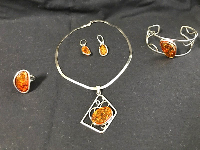 Amber jewelry catches the light like fossilized sunshine &ndash; nature's artistry transformed into wearable conversation pieces.