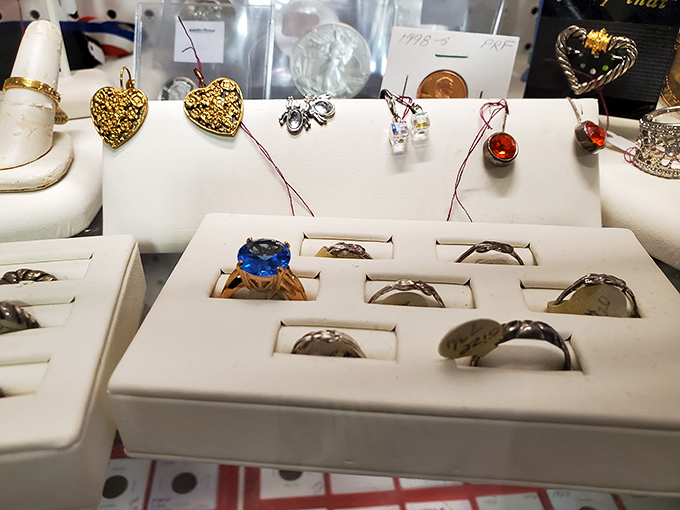 Rings that have seen more proposals than a business meeting. That blue stone in the center has probably witnessed at least one knee drop.