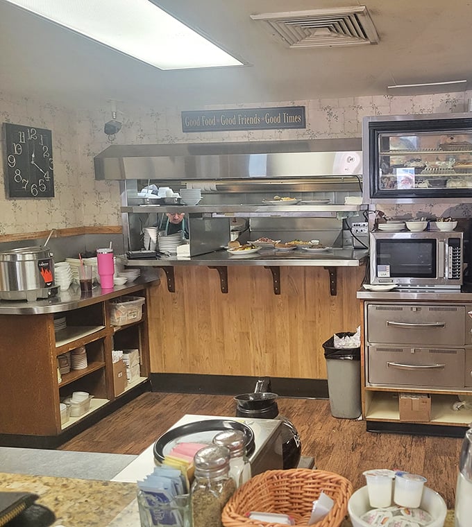 Where the magic happens &ndash; the kitchen view reveals the sign that says it all: "Good Food, Good Friends, Good Times."