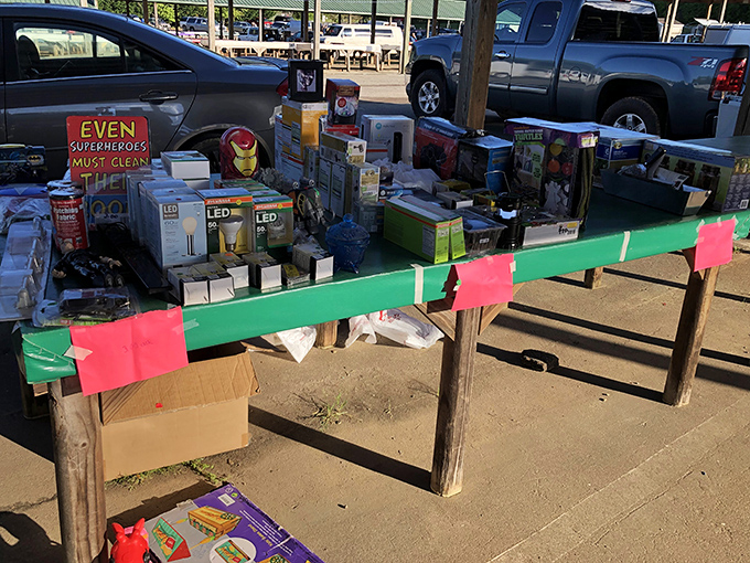 "Even superheroes must clean" proclaims the sign, surrounded by a jumble of household gadgets and LED lights&mdash;proof that even Batman needs a good deal occasionally.