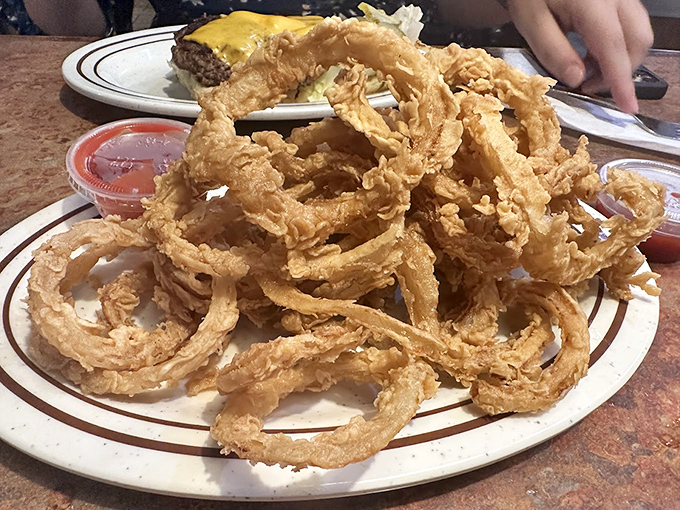 These aren't just onion rings&mdash;they're golden halos of crispy perfection that make you wonder why anyone would ever choose fries instead.